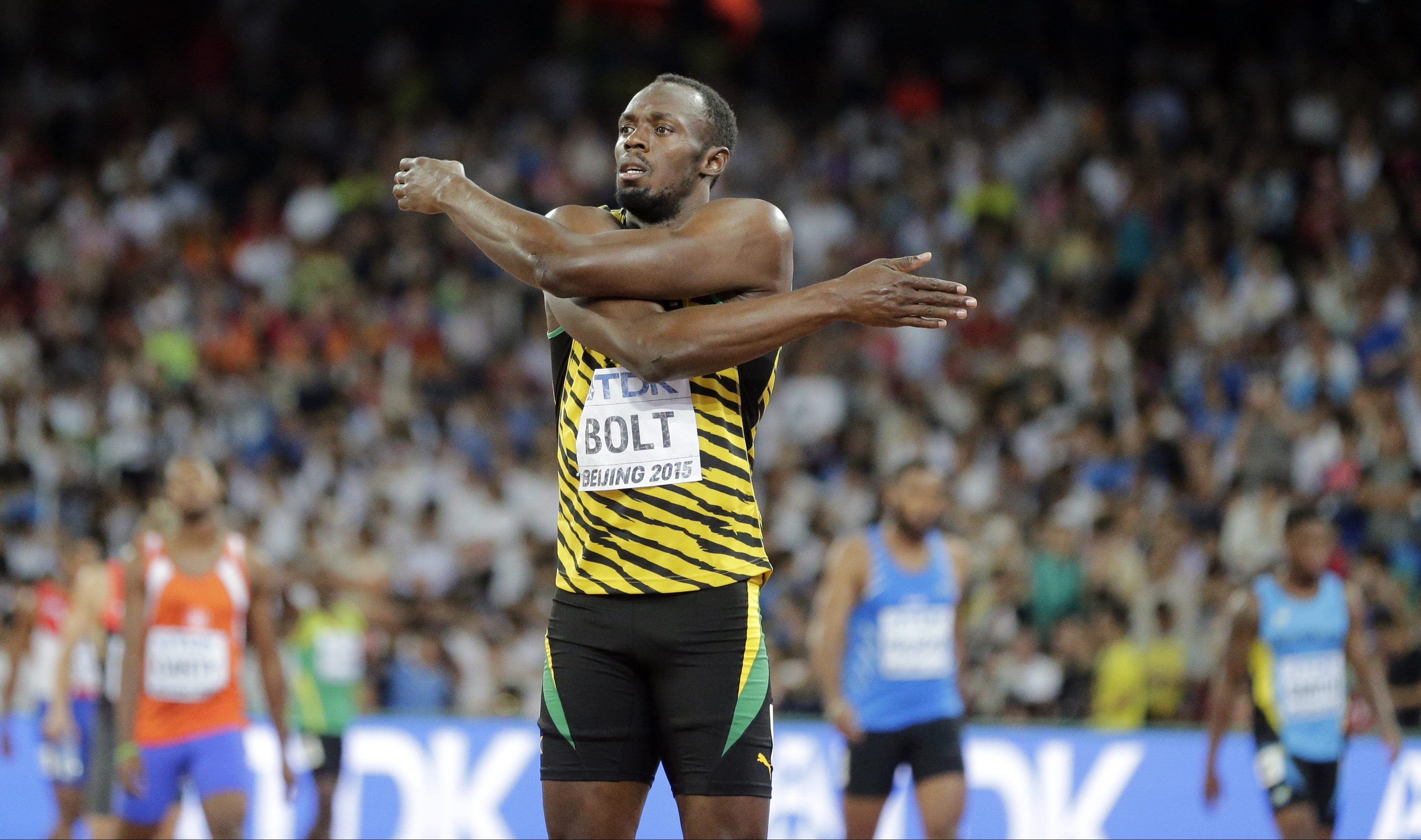 Usain Bolt, Justin Gatlin through to semifinals of 200 - Breitbart