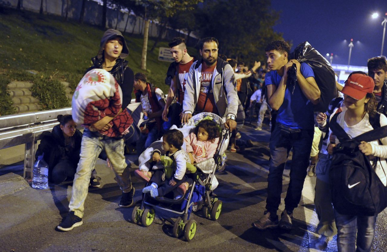 Photos: Migrants Flow Through Europe as EU Makes Countries Take Refugees