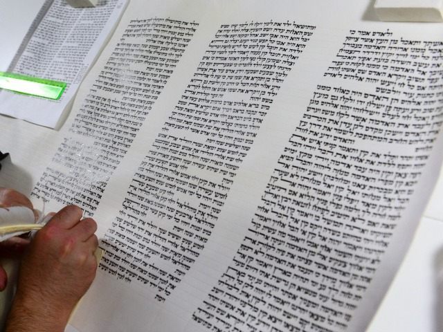 Muslim Writes Hebrew Letter in Community’s New Torah