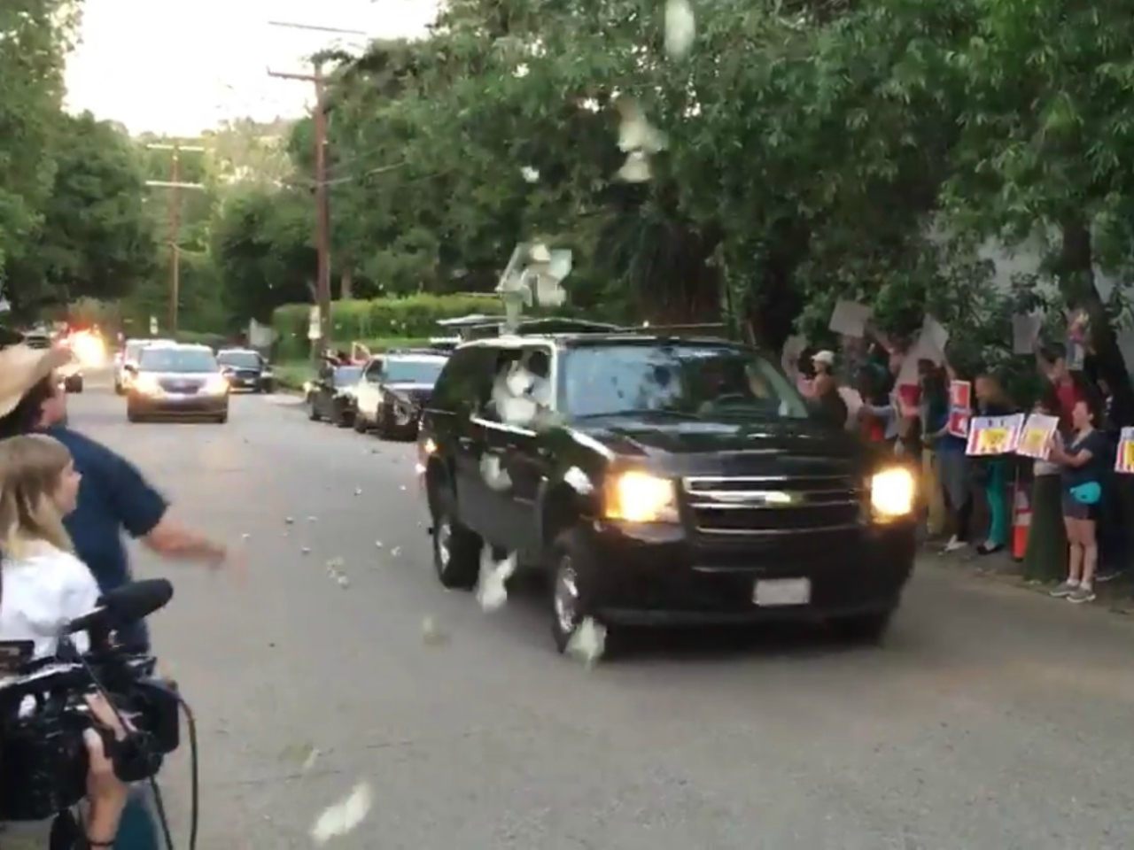 Sanders Fans Throw 1,000 $1 Dollar Bills at Hillary Clinton