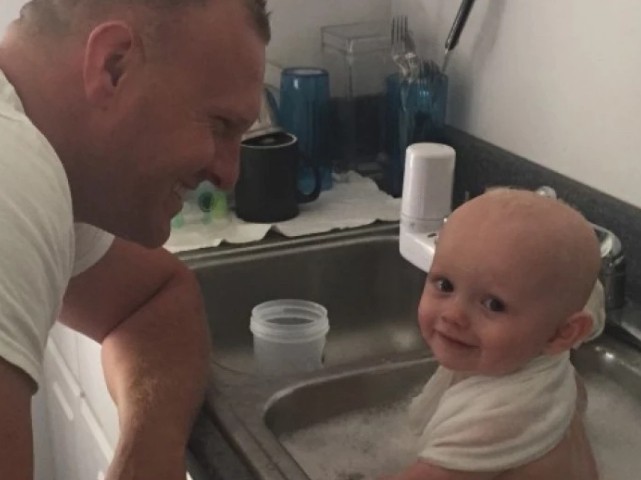 State Troopers Bathe Rescued Baby Covered In Vomit After Mom Was Pulled ...