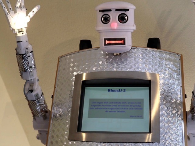 Robot Preacher Gives Automated Blessings and 'Beams Lights' from Hands