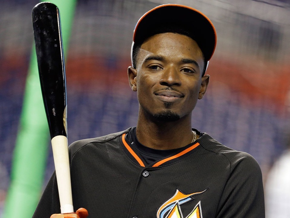 Watch: Young Reds Fan Kicks Marlins' Dee Gordon in the Shin