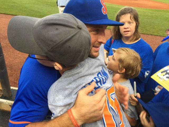 Tim Tebow Hugs an Autistic Fan, Then Smashes a Three-Run Homer