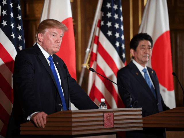Donald Trump Talks Tough on Trade in Japan