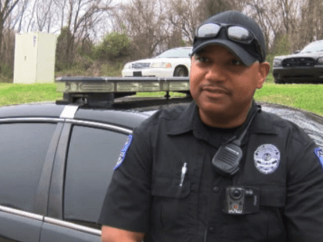WATCH: Cop's Quick Thinking Saves Man Pinned Under Wrecked Car