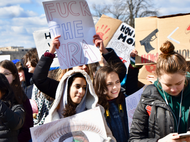 Youth Carrying Crude Signs, Demanding Gun Control, Descend on Nation’s ...
