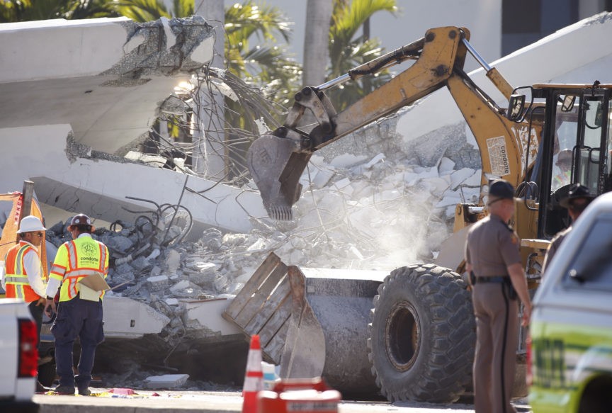 Tearful families wait as bodies remain under failed bridge - Breitbart