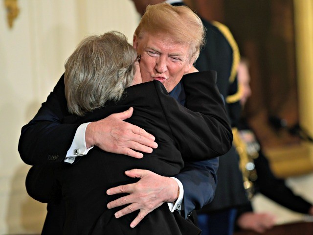 Widow of Medal of Honor Recipient Surprises Donald Trump with Big Hug
