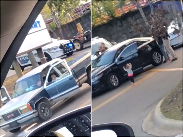 VIDEO: Barefoot Toddler Walks with Hands Raised Towards Armed Cops