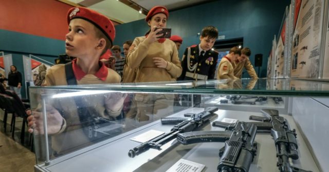 With exhibit and selfies, Russia marks Kalashnikov's 100th birthday ...