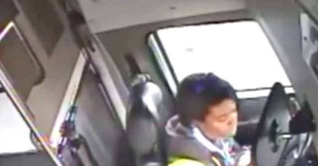WATCH: Bus Driver Rescues Child Wandering in Roadway