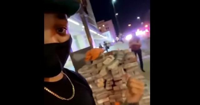 Watch: Piles of Bricks Showing Up in Downtown Dallas During Protest