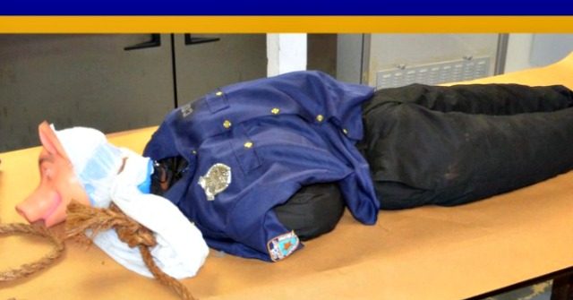 Mannequin Dressed as Cop Hanging Above Overpass in Mock Lynching