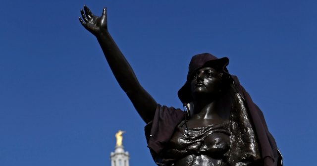 Protesters Topple 'Forward' Statue Outside of Wisconsin State Capitol