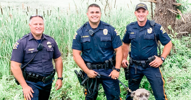 WATCH: Police Officer in Kayak Rescues Dog Stuck in Muddy Pond