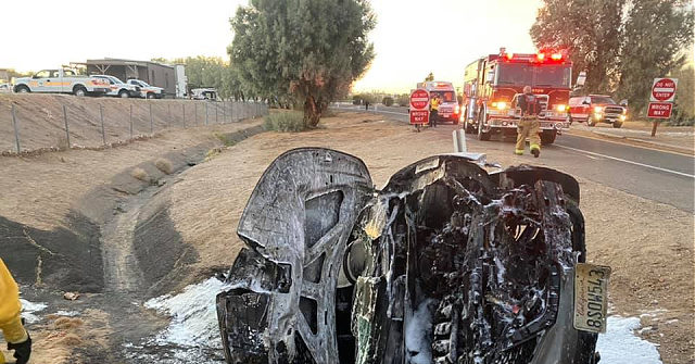 California Firefighters Rescue Woman Trapped in Burning Car