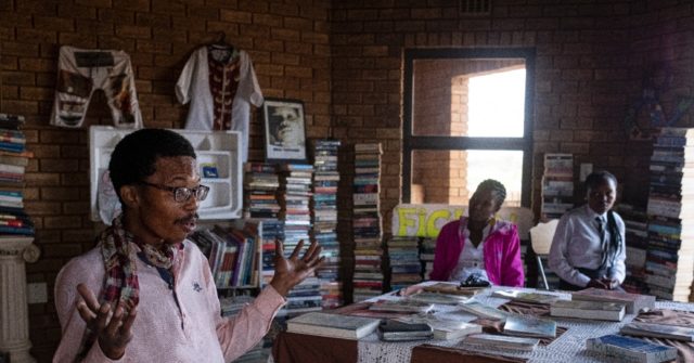 Homemade library builds bookish community in S.Africa's Soweto - Breitbart