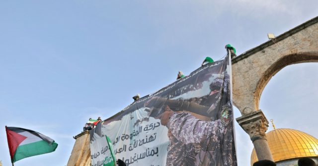 Hamas Banner with Image of Terrorist Hung on Temple Mount