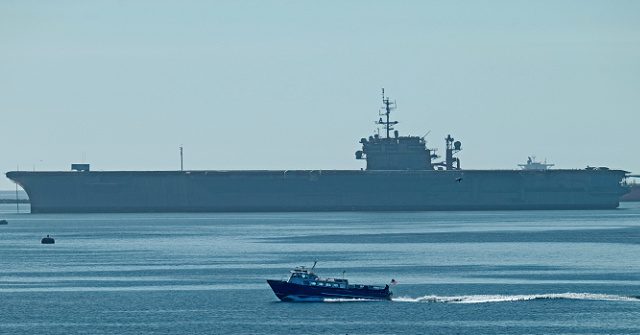 Aircraft Carrier USS Kitty Hawk Completes Final Voyage to Scrapyard