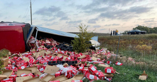 PHOTO: Budweiser Truck Crashes, Spilling Beer Cans Near Road