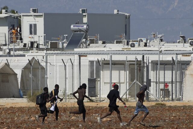 Fighting erupts at Cyprus migrant camp; 2 hurt, tents ablaze - Breitbart