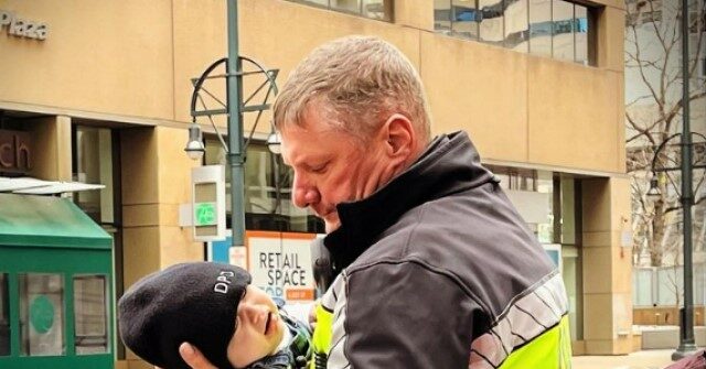 PHOTO: Officer Rescues Baby Who Stopped Breathing During Parade