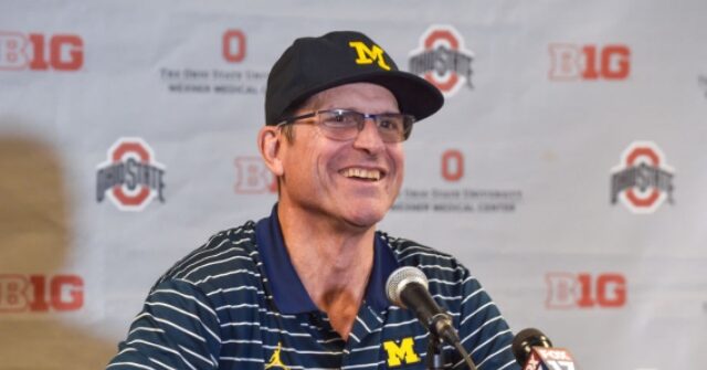 VIDEO: Michigan Head Coach Jim Harbaugh Helps Ann Arbor Police Officer ...