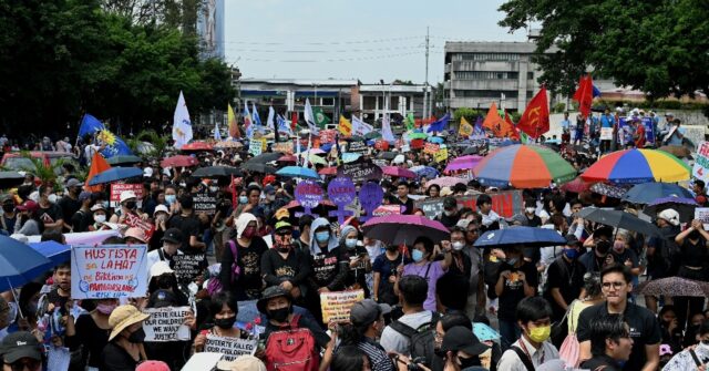 Philippine protesters celebrate 'People Power' ousting of Marcos Sr ...