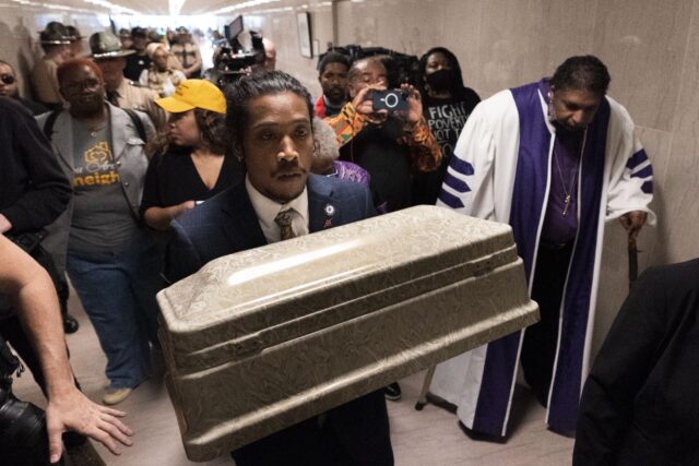 Gun safety demonstrators carry caskets to Tennessee Capitol - Breitbart