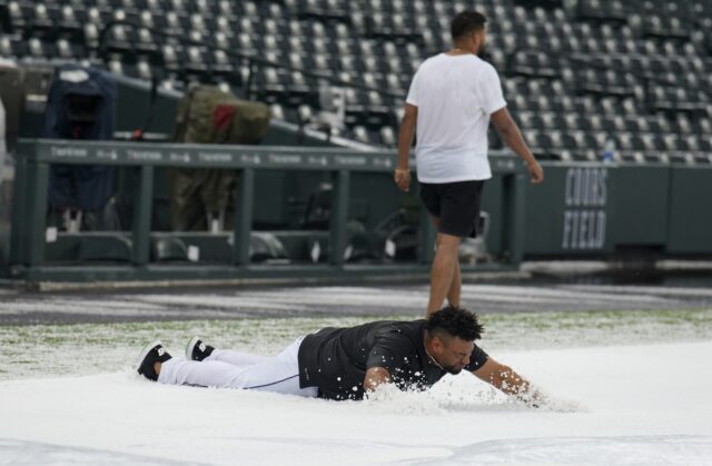 All Hail the Rockies! Pea-sized hail makes Coors Field a winter ...