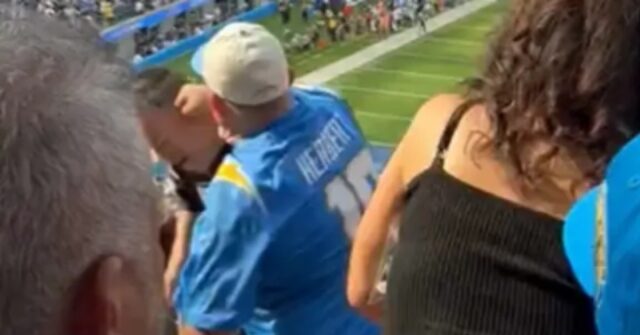 VIDEO: Raiders Fan Pushed Down Steps During Fight with Chargers Fan
