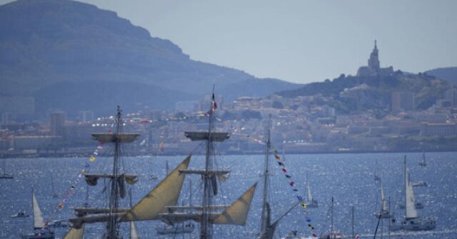 WATCH: A 19th Century Ship Carrying the Olympic Torch Arrives in ...