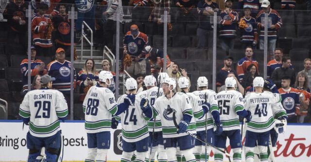 Boeser, Lindholm score 2 each as Canucks beat Oilers 4-3 to take 2-1 ...