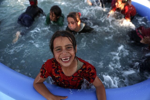 Mobile pools offer relief from heat to children in north Syria camps ...