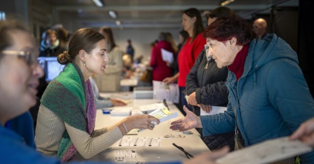 Lithuanians vote in parliamentary election with many looking for change ...