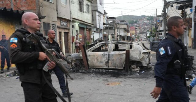 Huge raid on Rio gang leaves at least 10 people dead and 80 under ...