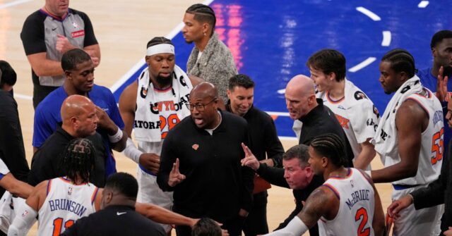 Mike Brown gets a win and a hug from Spike Lee in his first game as ...