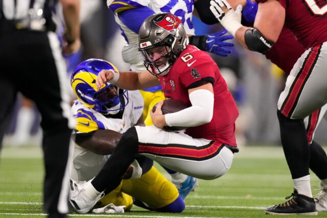 Buccaneers QB Baker Mayfield exits with left shoulder injury, replaced by Teddy Bridgewater vs ...