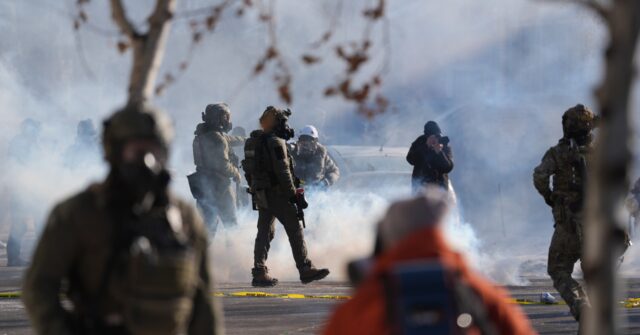 Governor: A person has been shot, killed by federal officers in ...