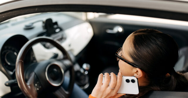 WATCH: One-Handed Woman Accused of Holding Cellphone in Car